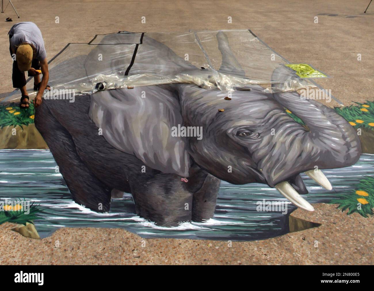 Dutch artist Remko Van Schaik, 45, applies finishing touches on his 3D ...