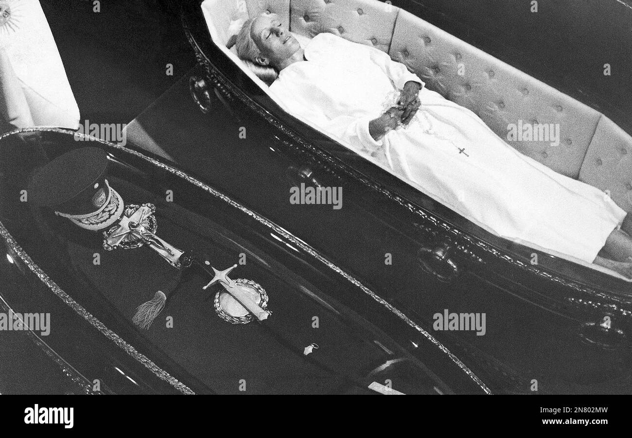 FILE - In this Dec. 7, 1974 file photo, the body of Eva Peron lies in state next to the remains ...