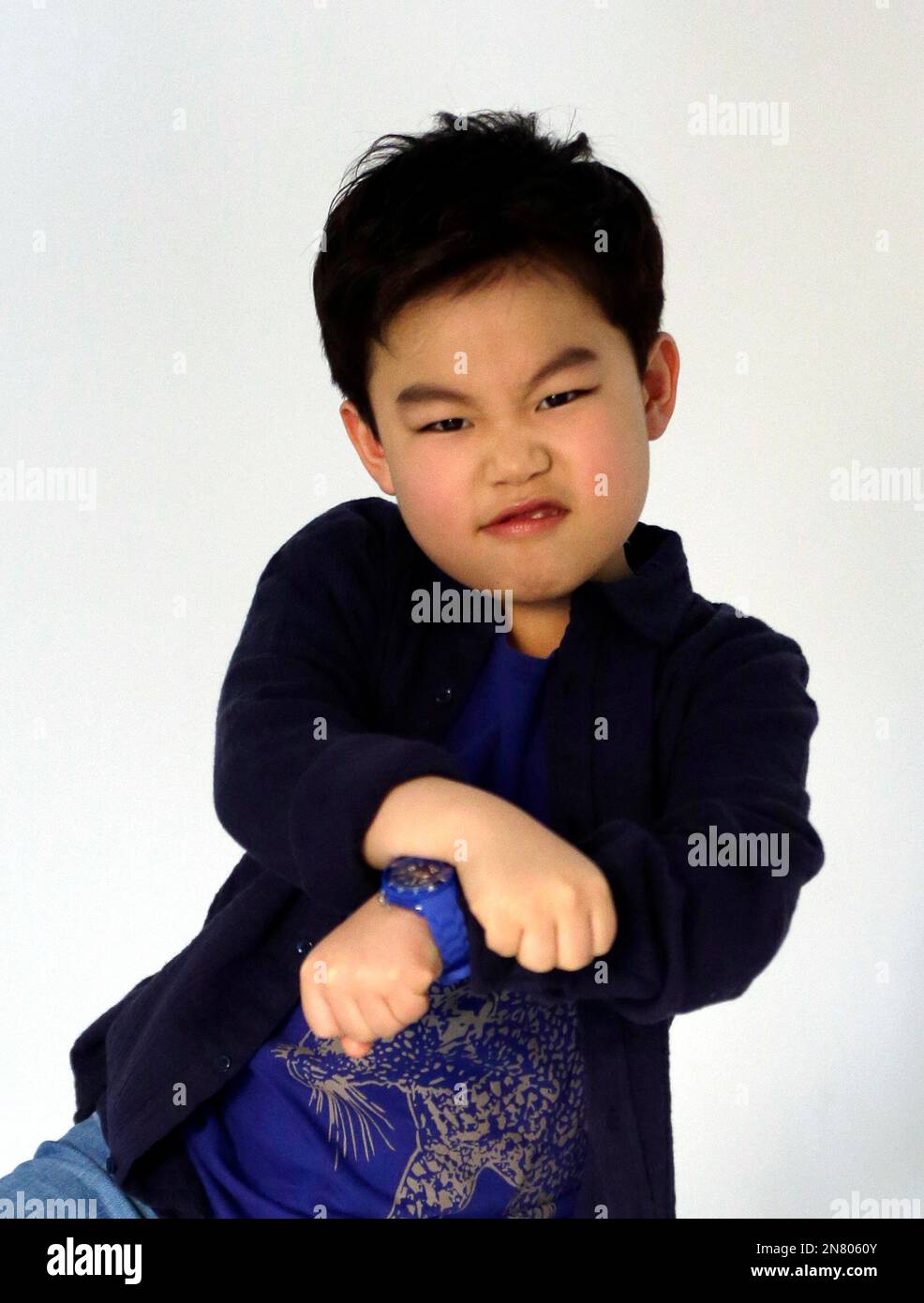 Hwang Min-woo, also known as a Little PSY, poses for the media at a ...