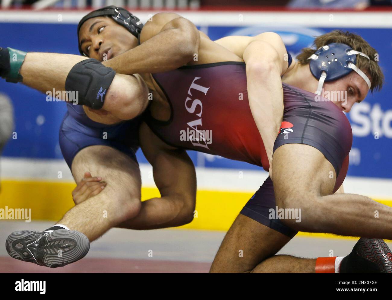 Ernest Fogle, bottom, of Pocono Mountain East grapples with Kyle Narber ...