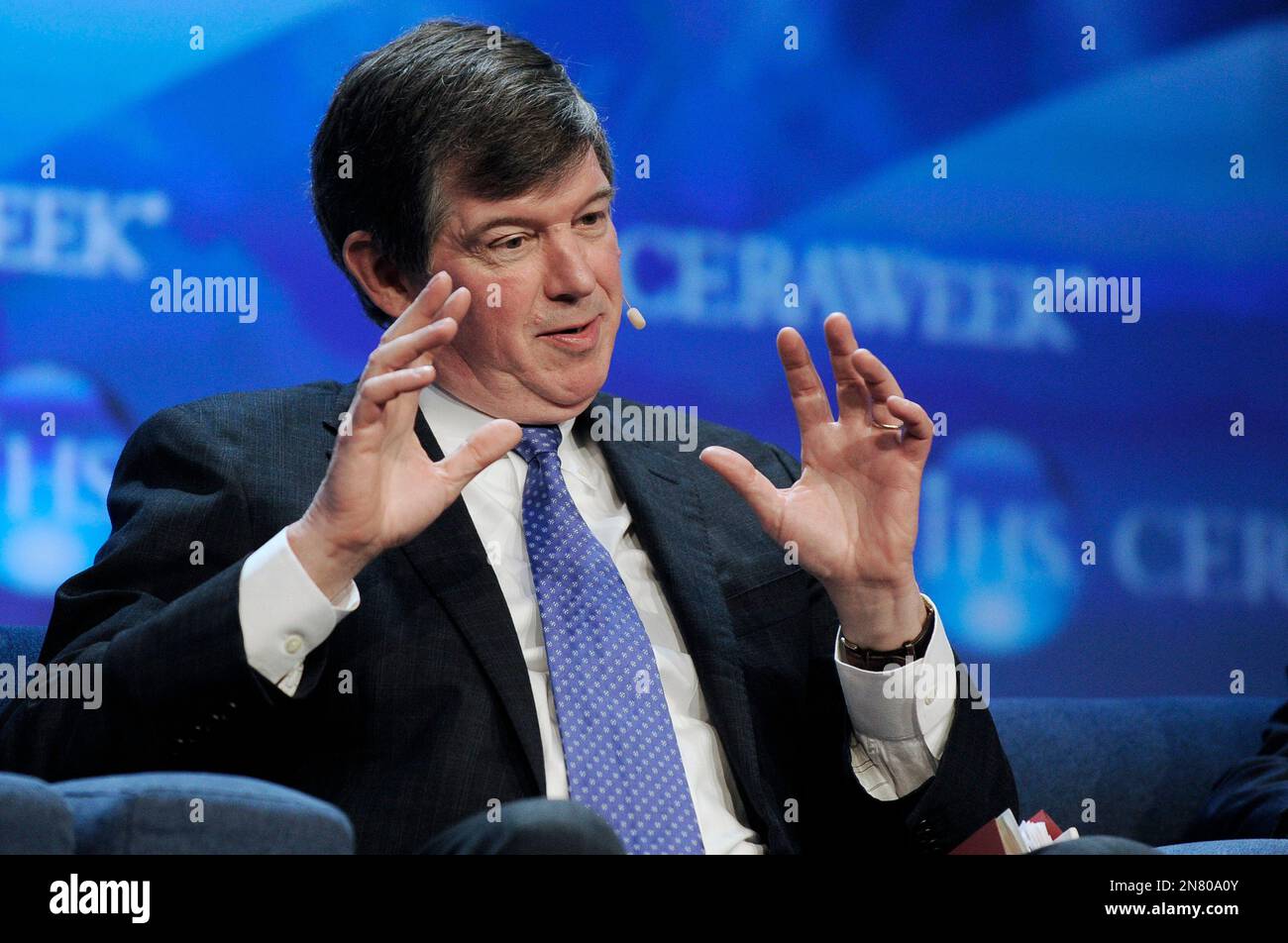 PG&E Corp. chairman, CEO and president Anthony Earley laughs during a ...