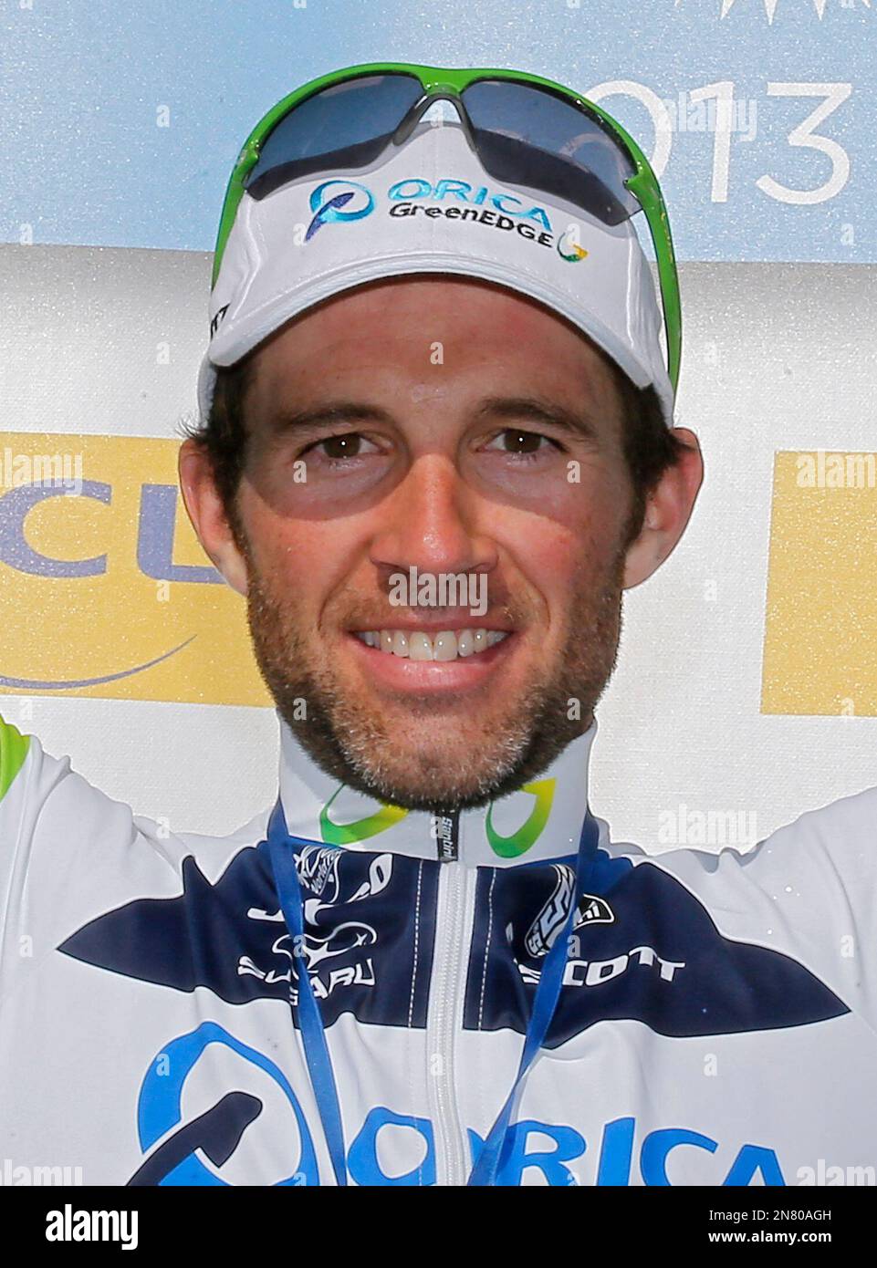 Michael Albasini of Switzerland reacts on the podium after winning the ...