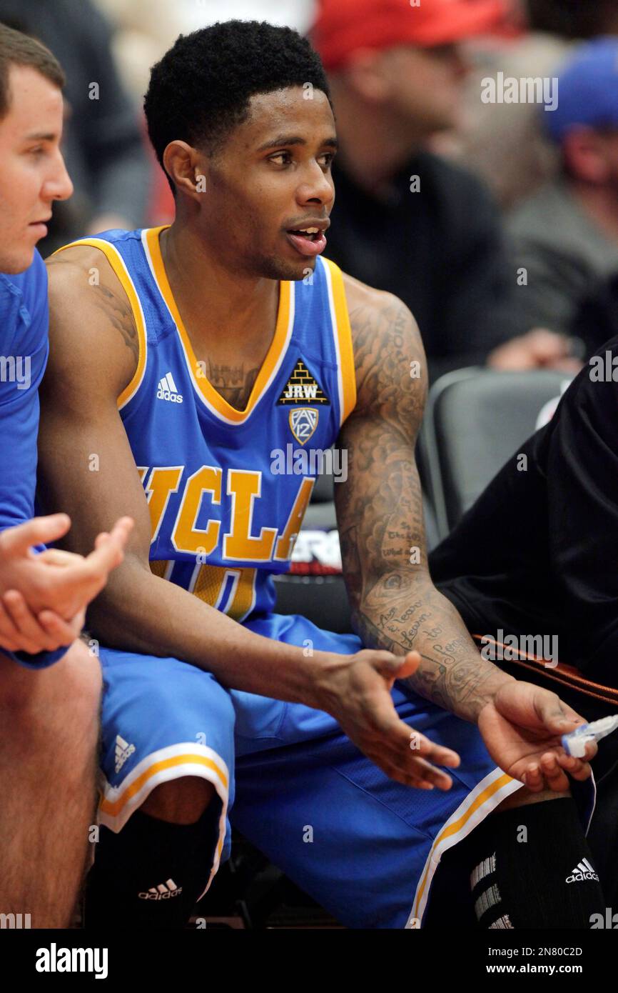 UCLA guard Larry Drew II (10) tries to explain to a teammate what was ...