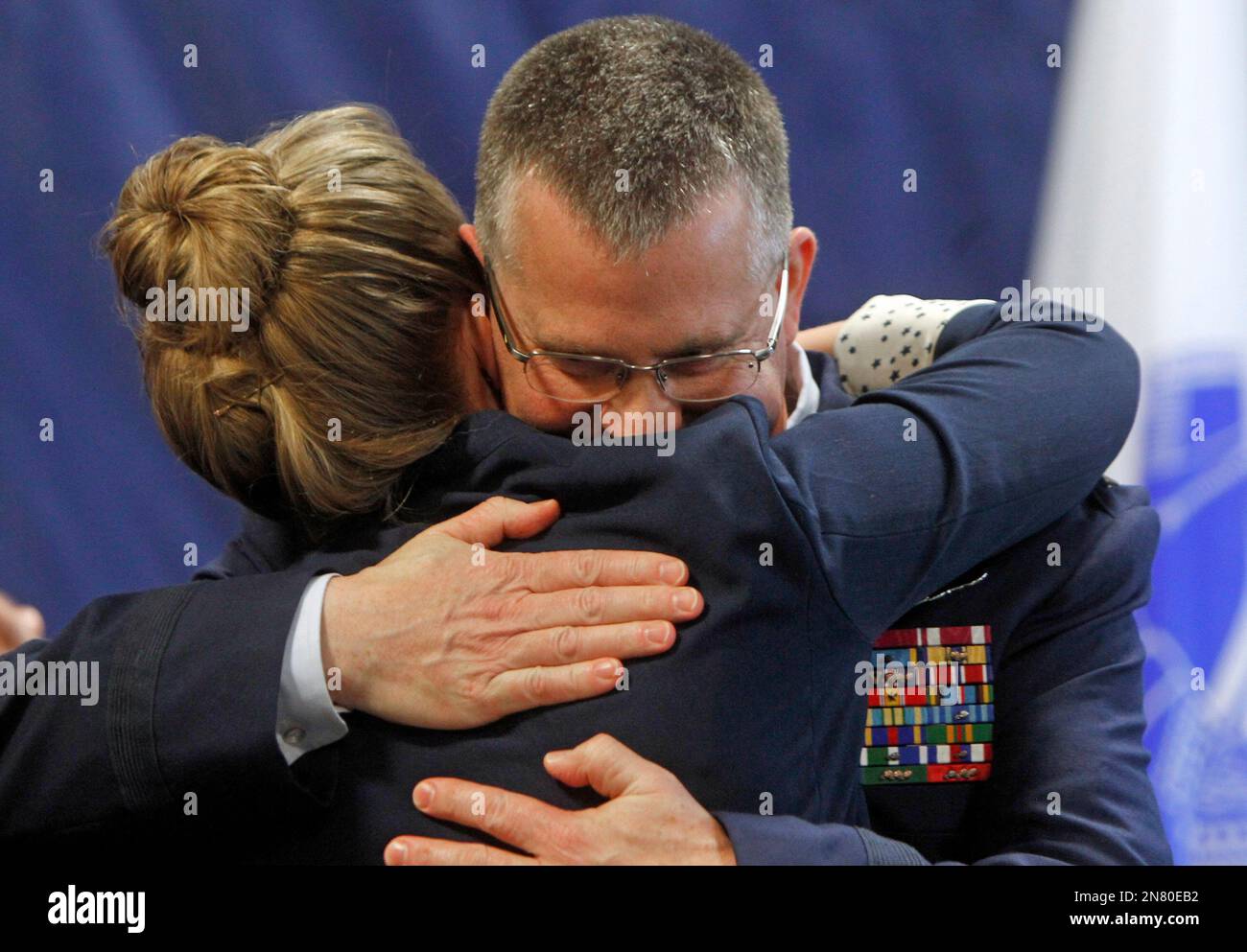 Brigadier Gen. Steven Cray gets a hug from his daughter, Lauren, during ...