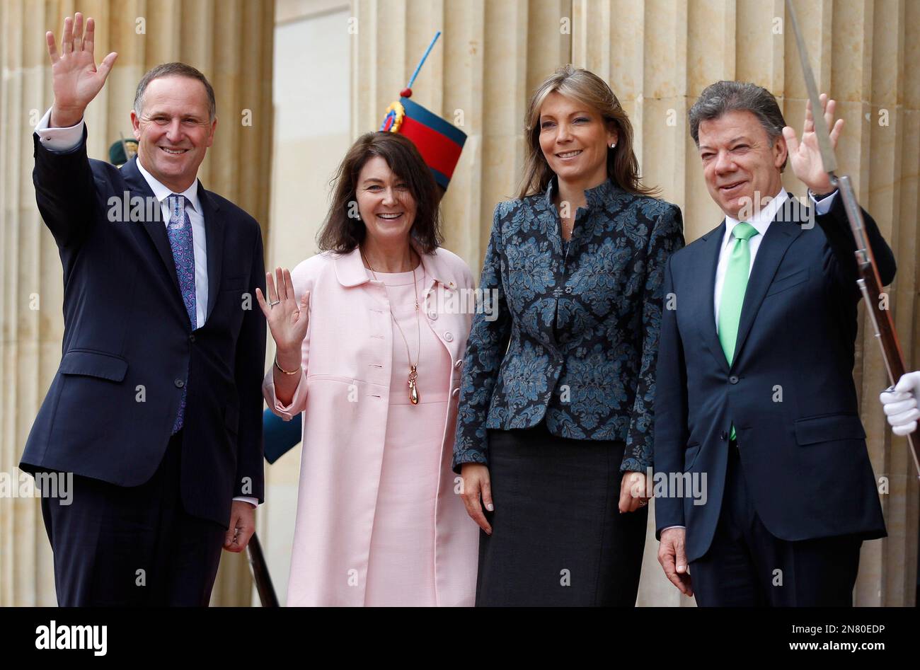 New Zealand's Prime Minister John Phillip Key, left, accompanied by his ...