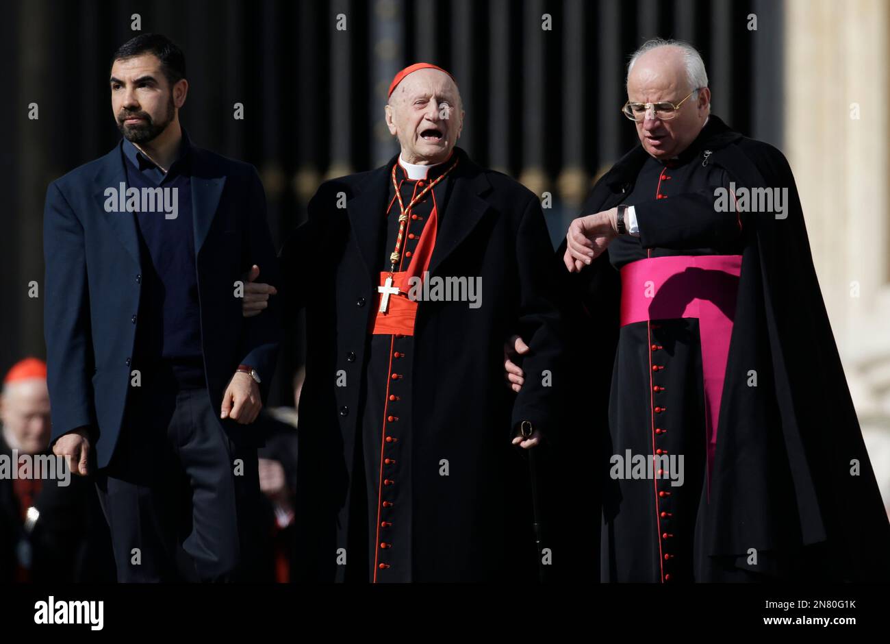 Cardinal Paul Poupard, center, arrives for Pope Benedict XVI's last ...