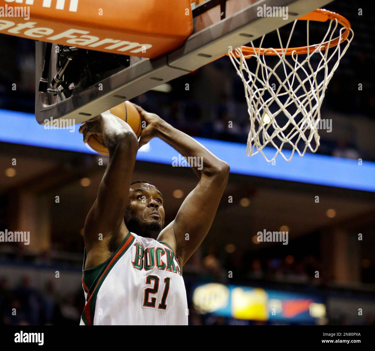 Milwaukee Bucks' Samuel Dalembert goes in for a dunk against the Utah ...