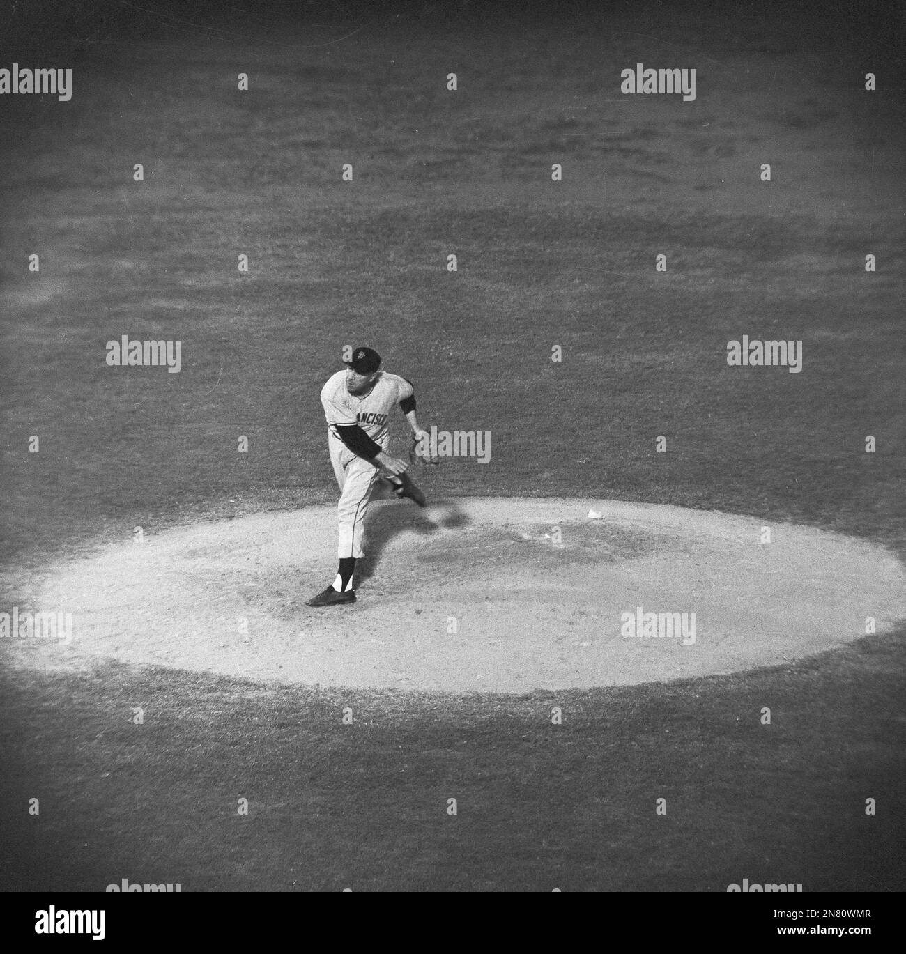 Sam Jones of the San Francisco Giants pitching at the Los Angeles ...