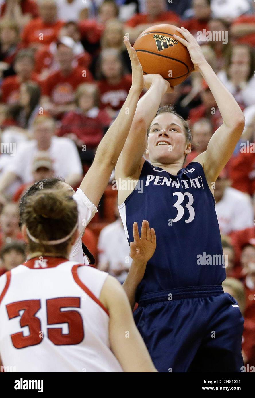 Penn State's Maggie Lucas (33) shoots over Nebraska's Rachel Theriot ...