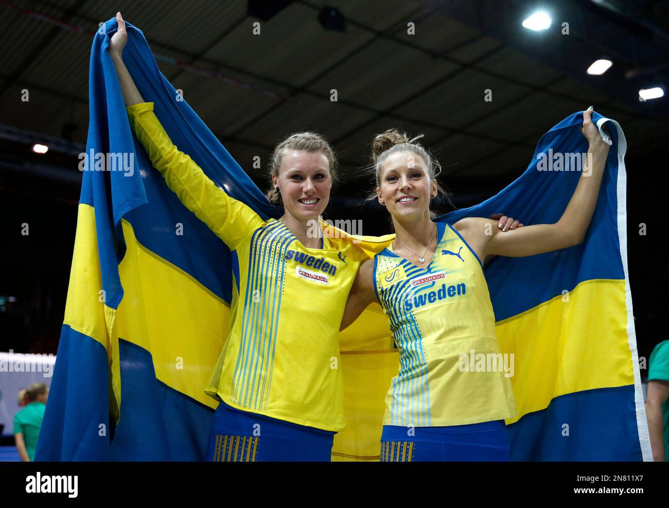 Sweden's silver medal winner Ebba Jungmark, right, and her teammate ...