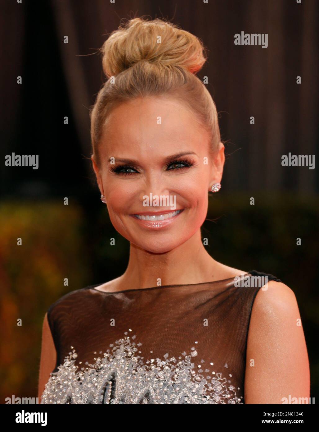 Actress Kristin Chenoweth arrives at the 85th Academy Awards at the ...