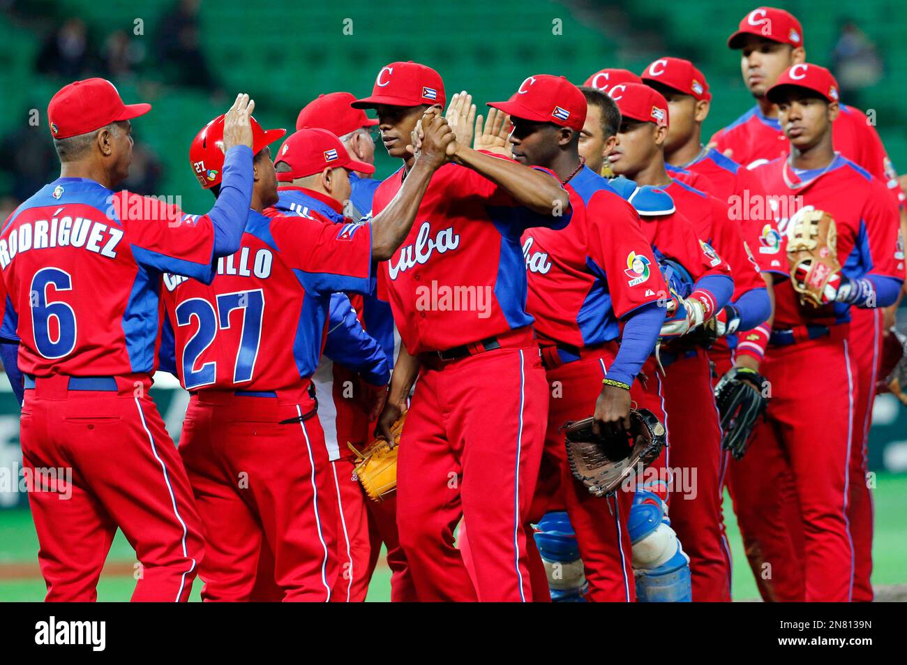 Cuba's players celebrate after defeating Brazil 5-2 in their World ...