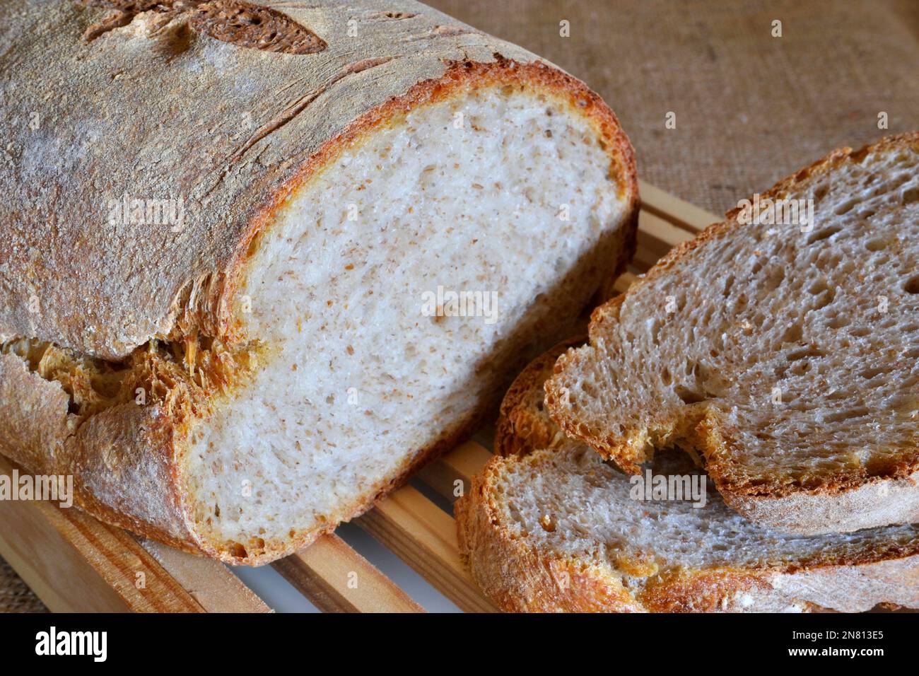 Italian food: loaf of bread on a cutting board, Italy Stock Photo - Alamy