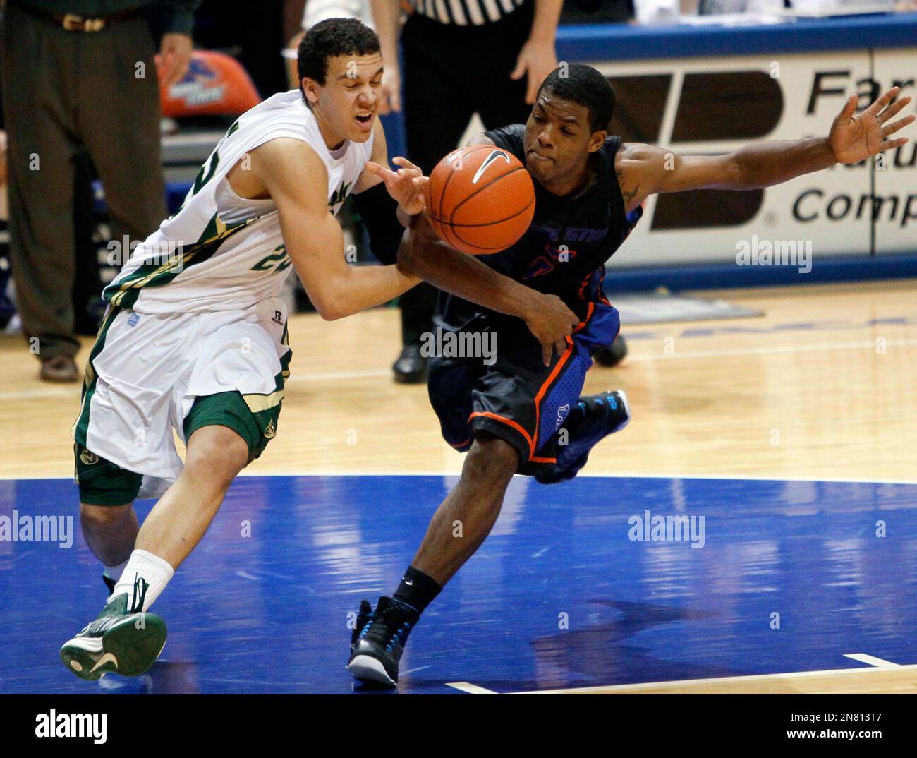 Colorado State guard Dorian Green (22) is fouled by Boise State guard ...