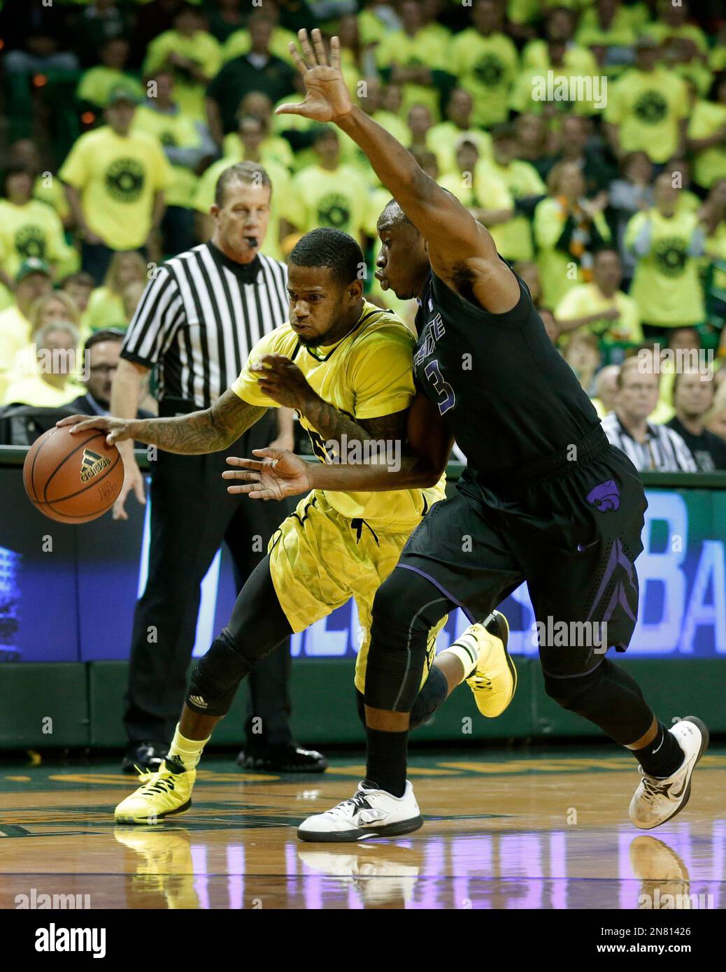 Baylor guard Pierre Jackson, left, attempts to get past Kansas State ...