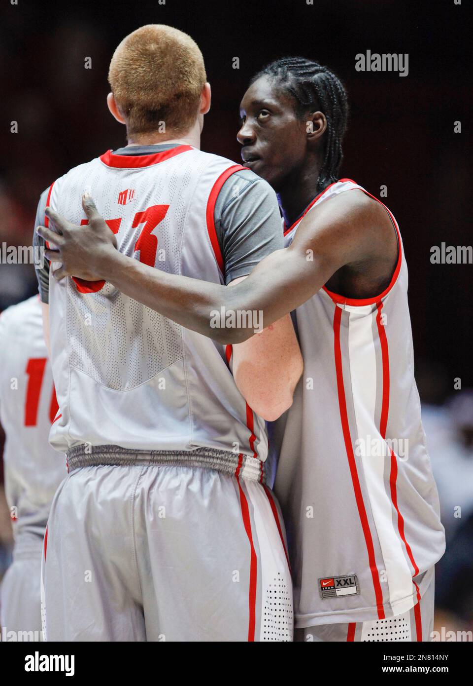 New Mexico's Tony Snell, right, hugs teammate Alex Kirk near the end of ...