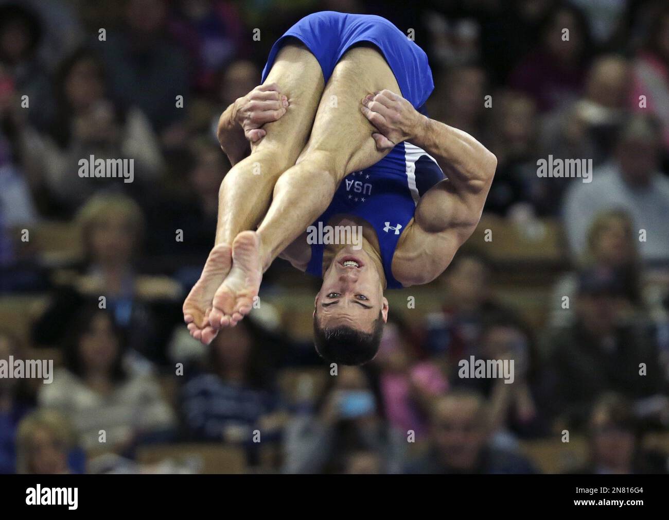 Jacob Dalton, of the United States, flips while performing on the floor ...