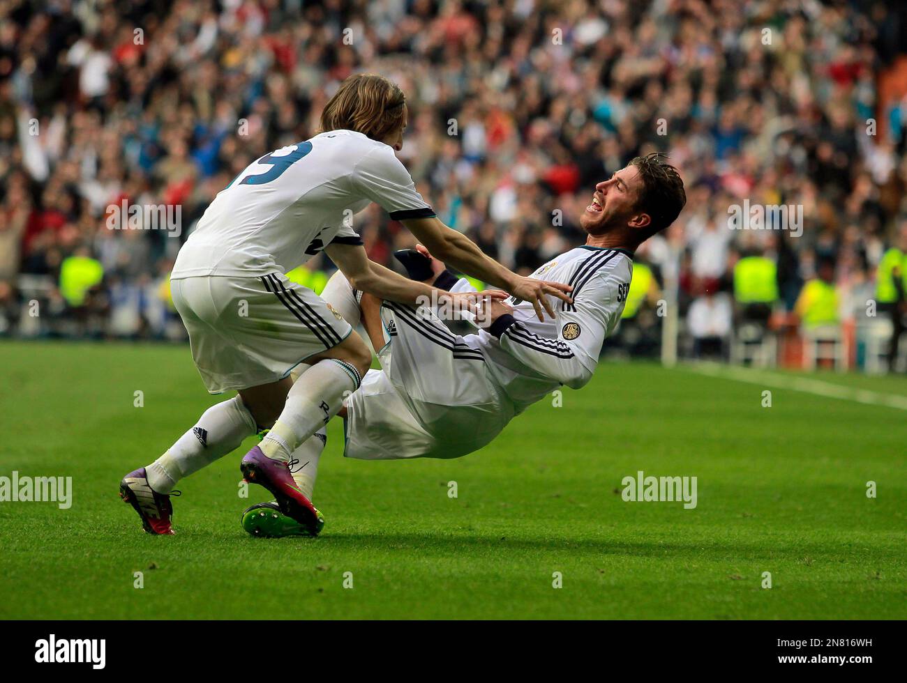 Real Madrid's Sergio Ramos, right, celebrates his goal with Luka Modric ...