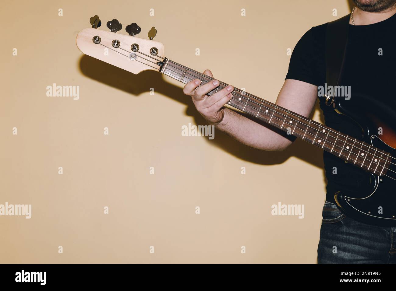 Bass guitar riff closeup. Musical background Stock Photo - Alamy