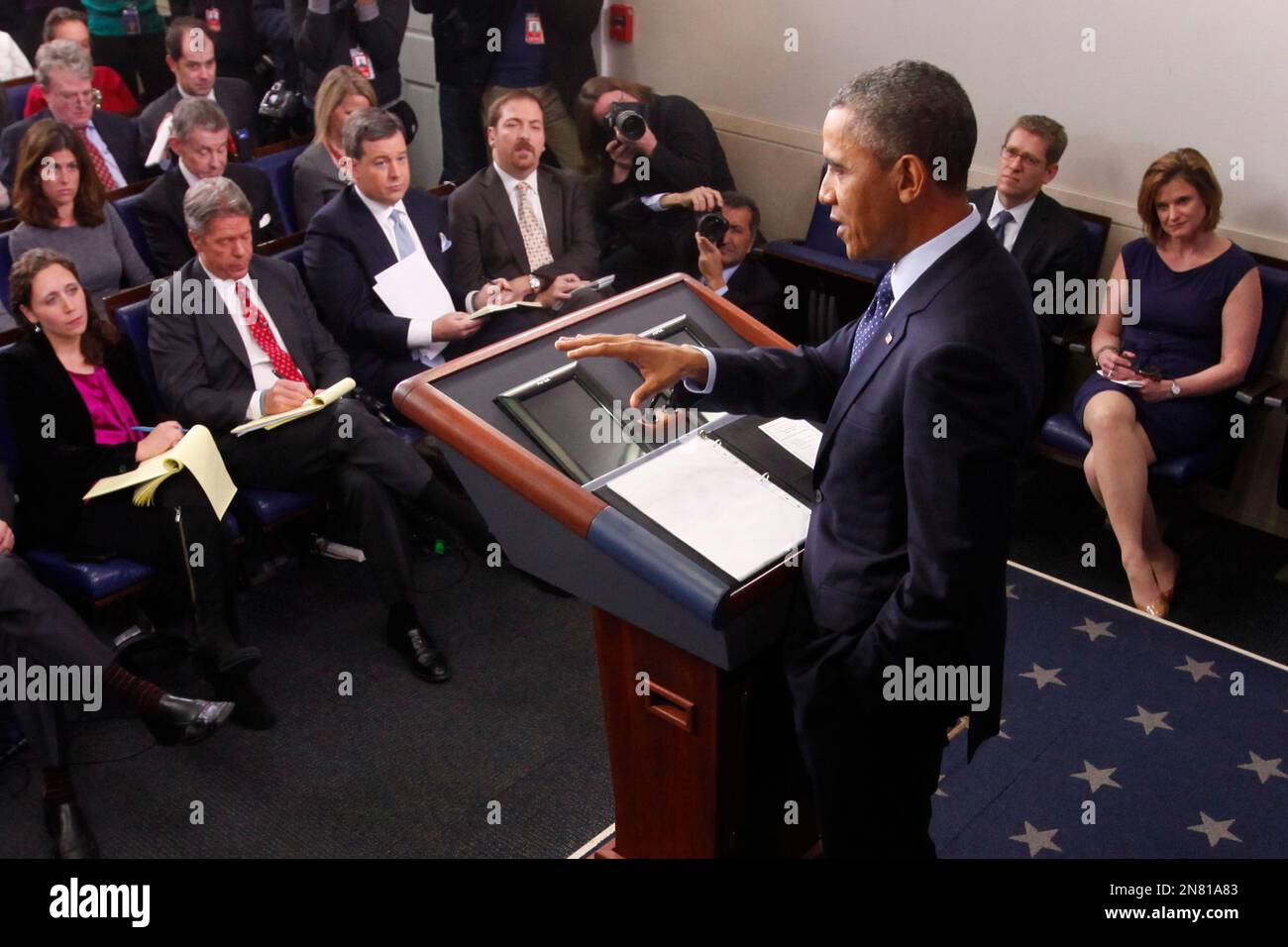 President Barack Obama answers a reporter's question after meeting with ...