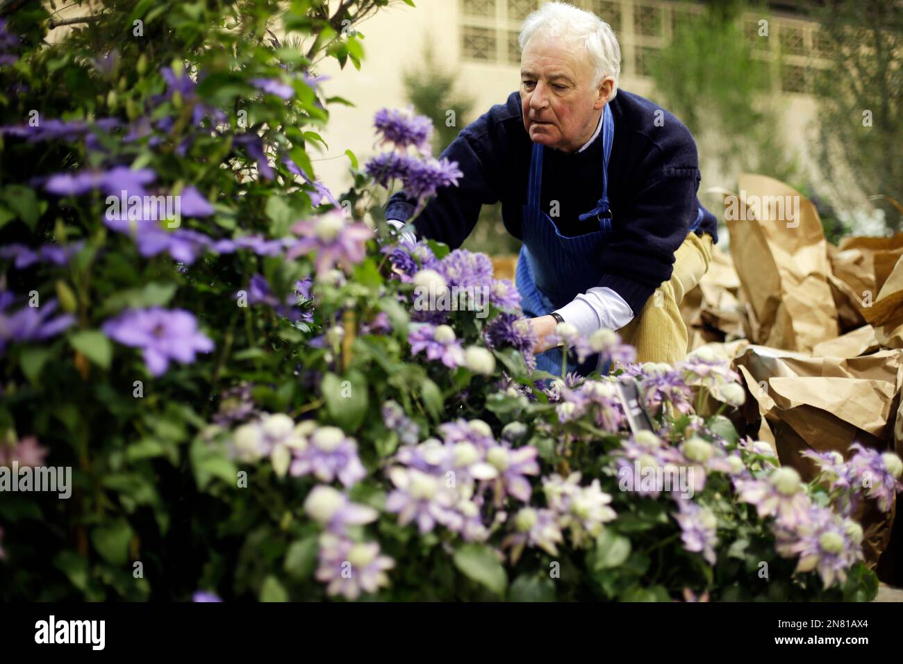 This Feb. 28, 2013 photo shows Raymond Evison working on his ...