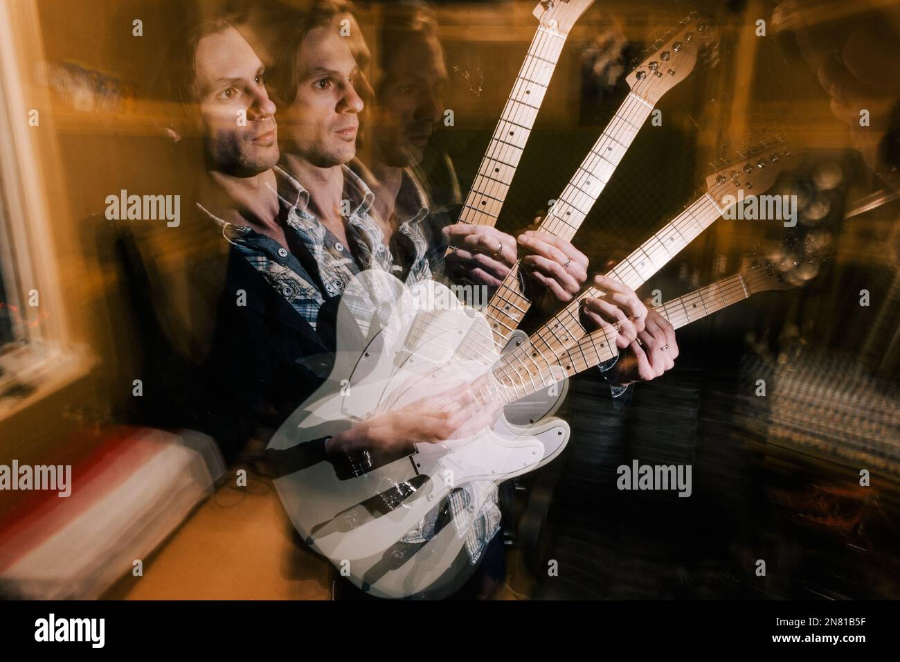 Creative guitarist portrait in double exposure Stock Photo - Alamy