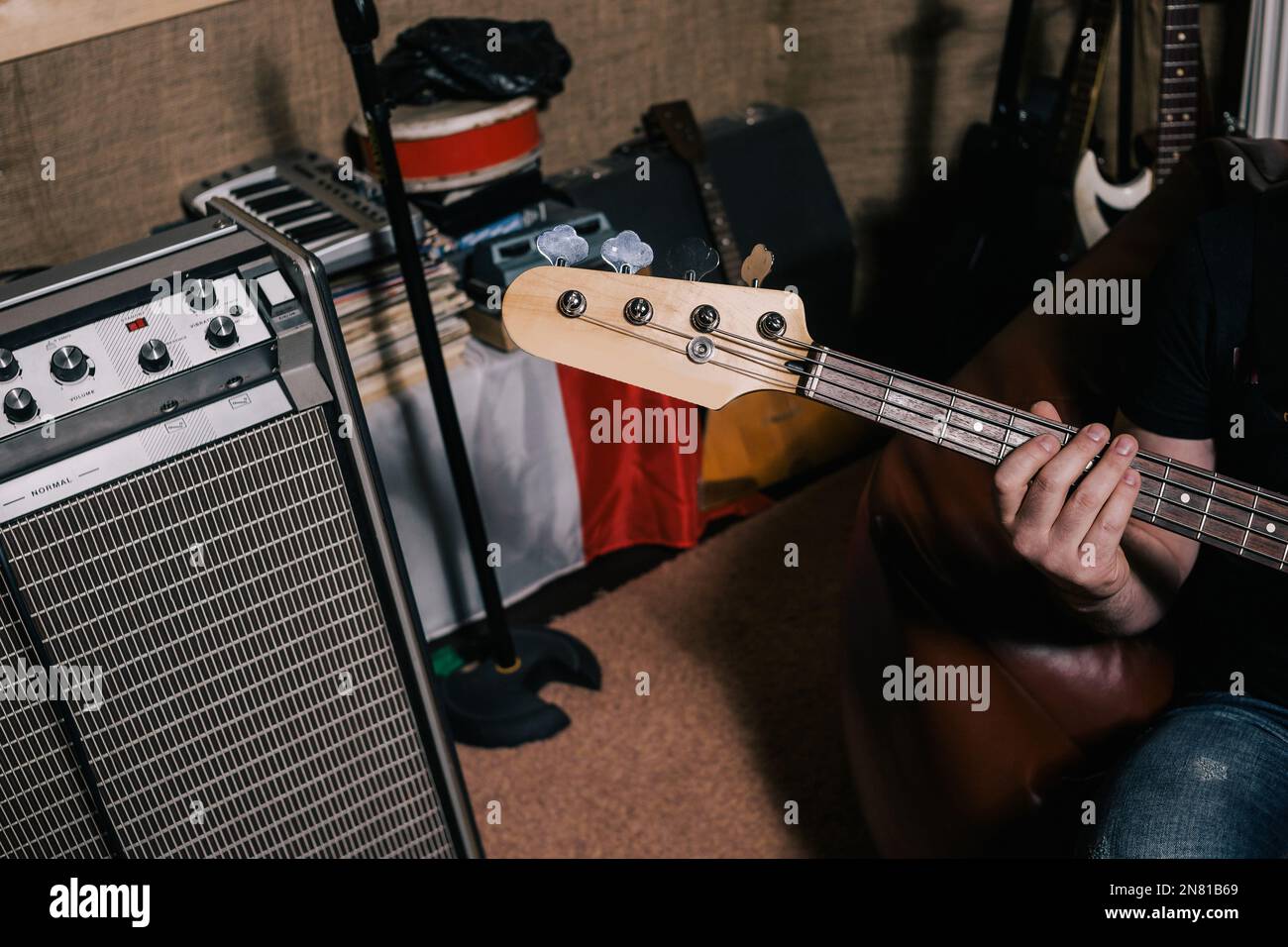 Bass guitar riff in studio closeup Stock Photo - Alamy