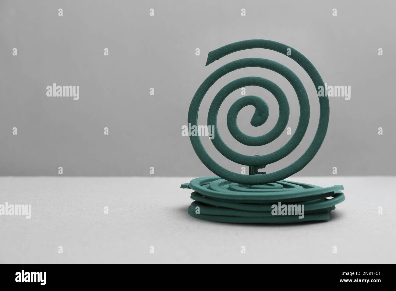 New insect repellent coils on grey background Space for text Stock ...