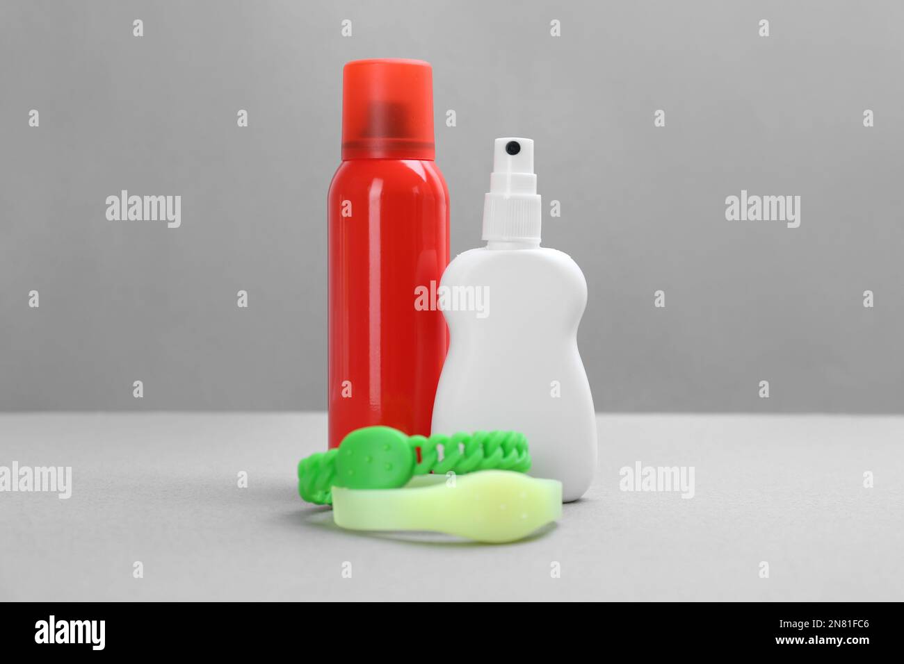 Set of different insect repellents on grey background Stock Photo - Alamy