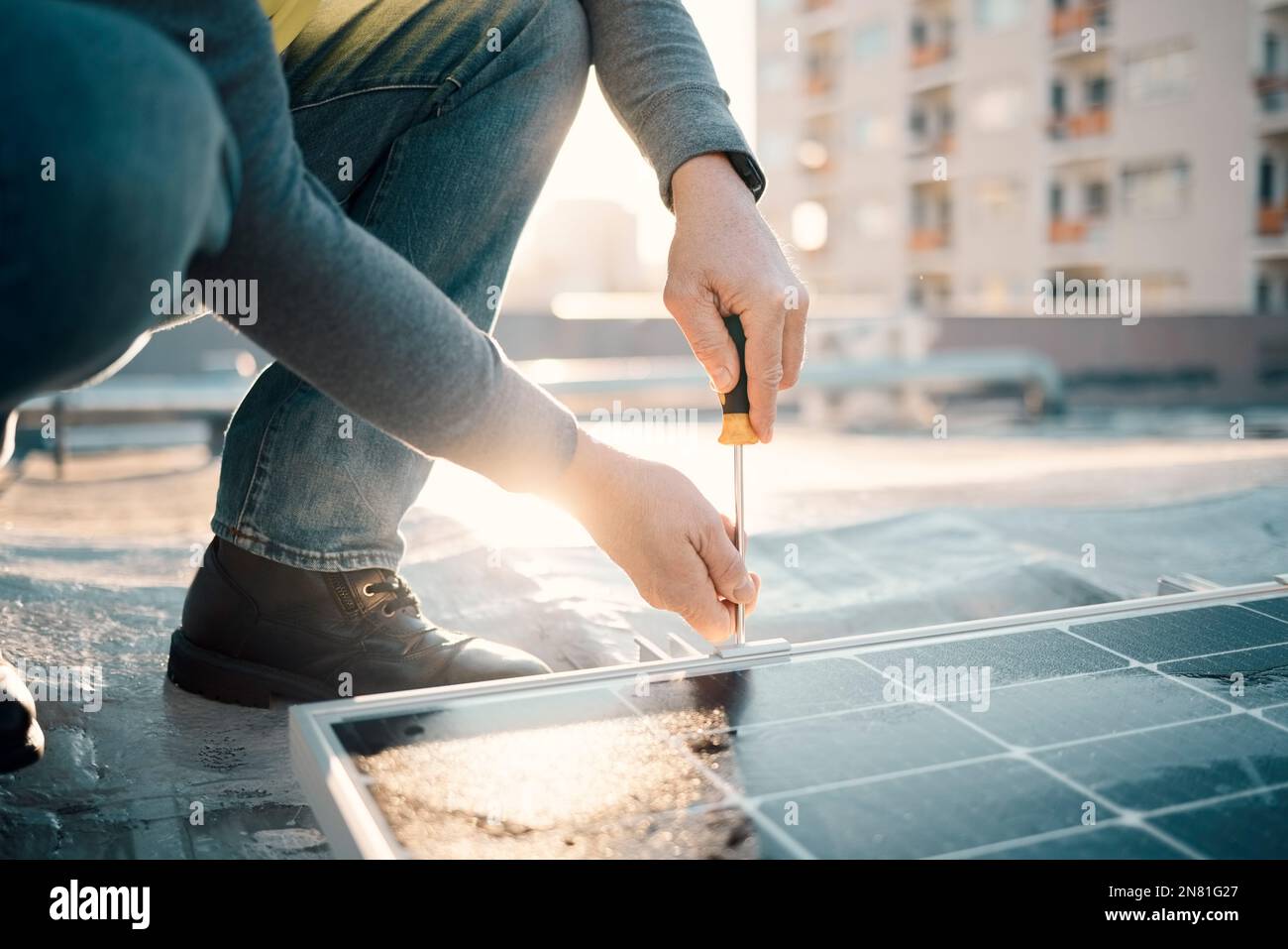 Solar panel, screwdriver and worker hands with tools for renewable ...