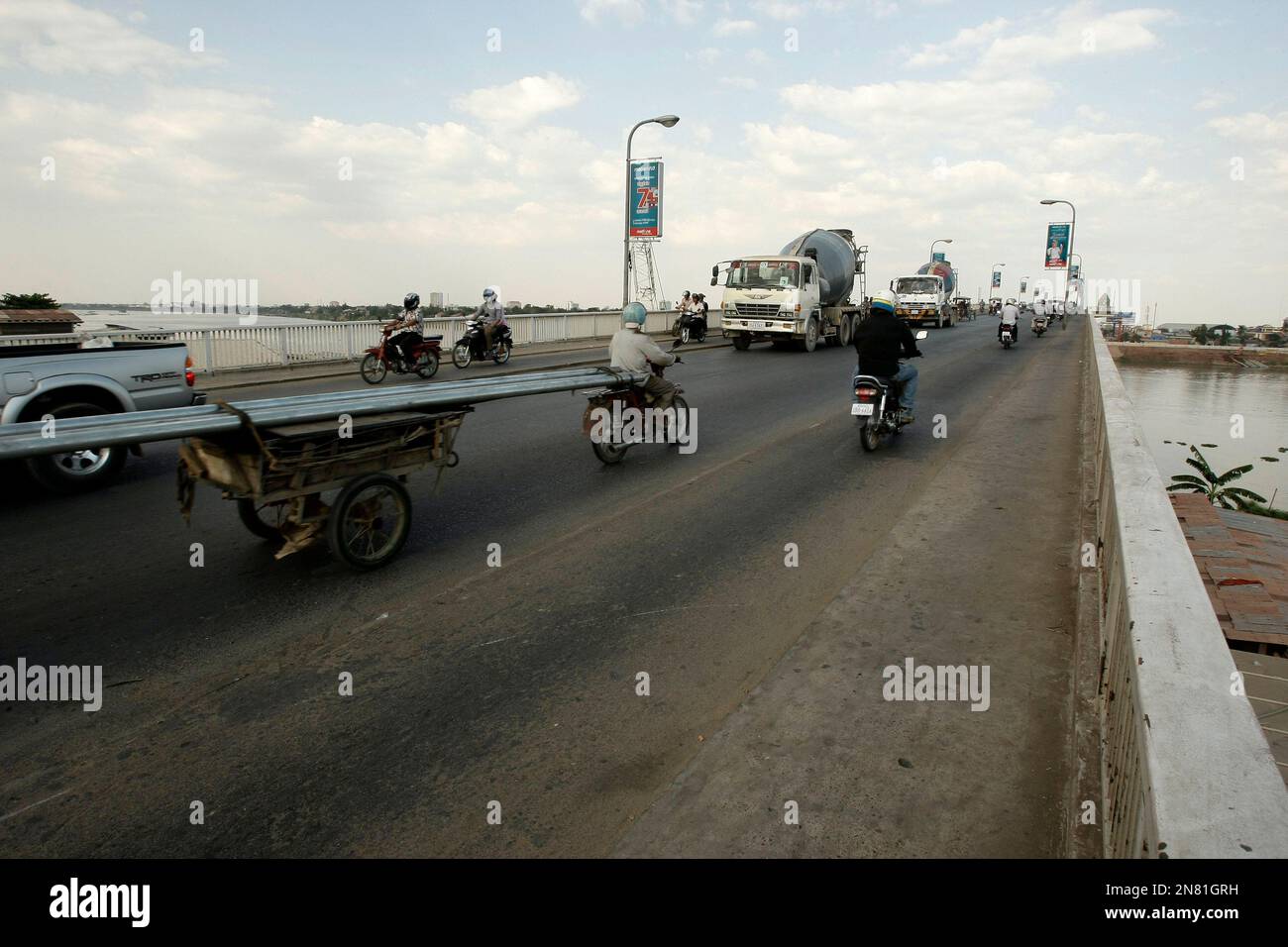 In this photo taken, Feb. 25, 2013, local motorists transport the Chroy ...