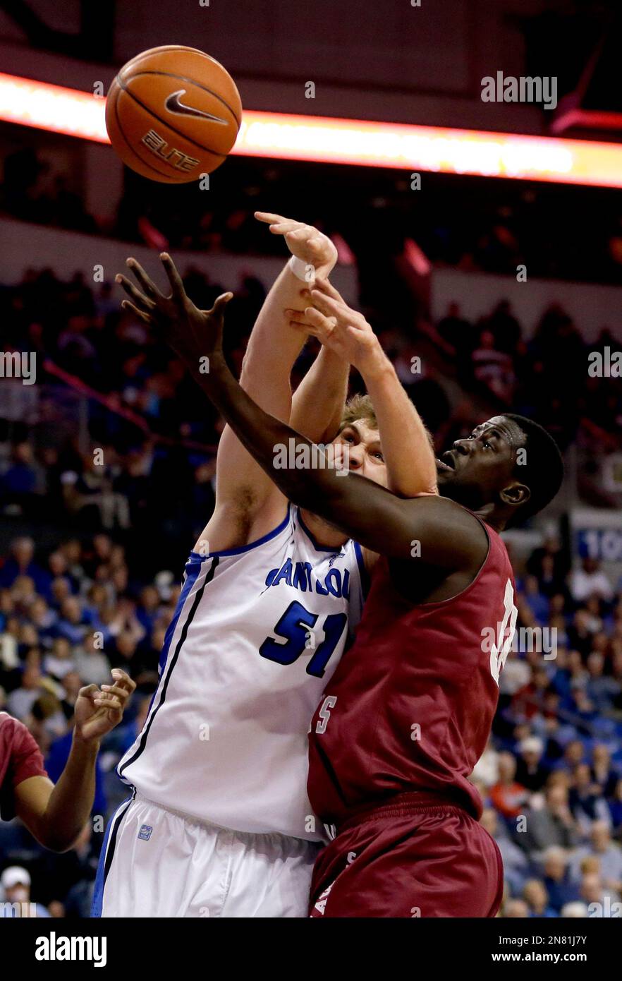 Saint Louis forward Rob Loe, right, and Saint Joseph's forward Papa ...