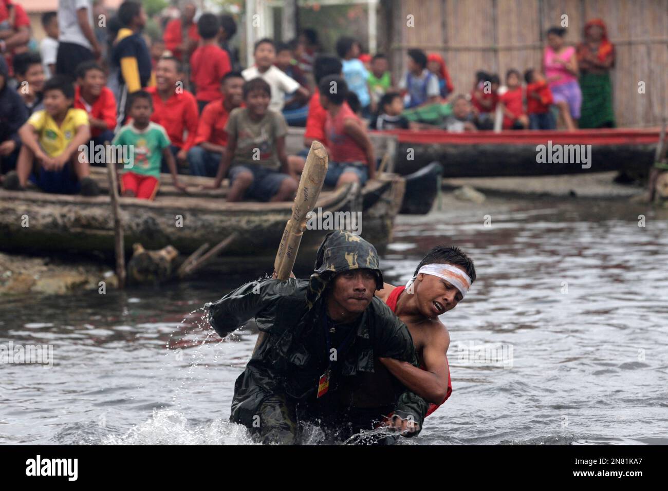 In this Feb. 25, 2013 photo, men participate in a reenactment of a ...
