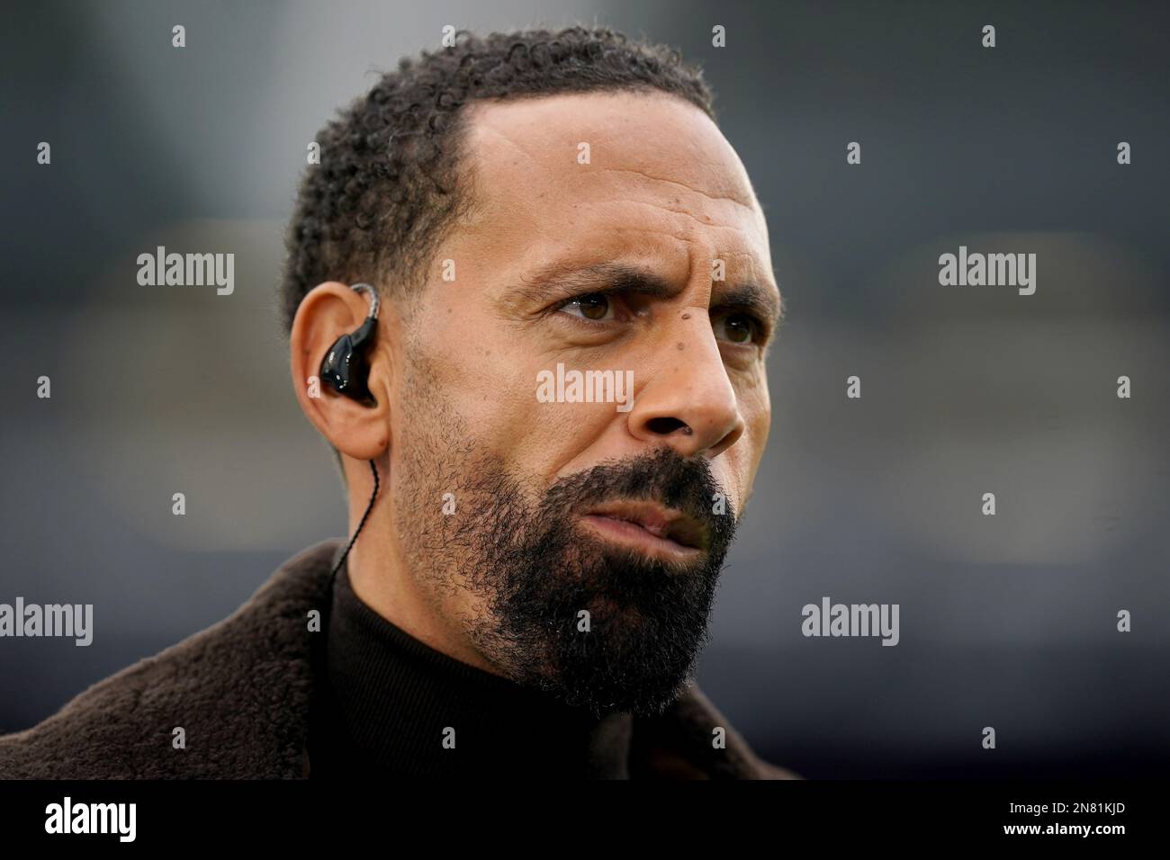 Former footballer, Rio Ferdinand, looks on ahead of the Premier League ...