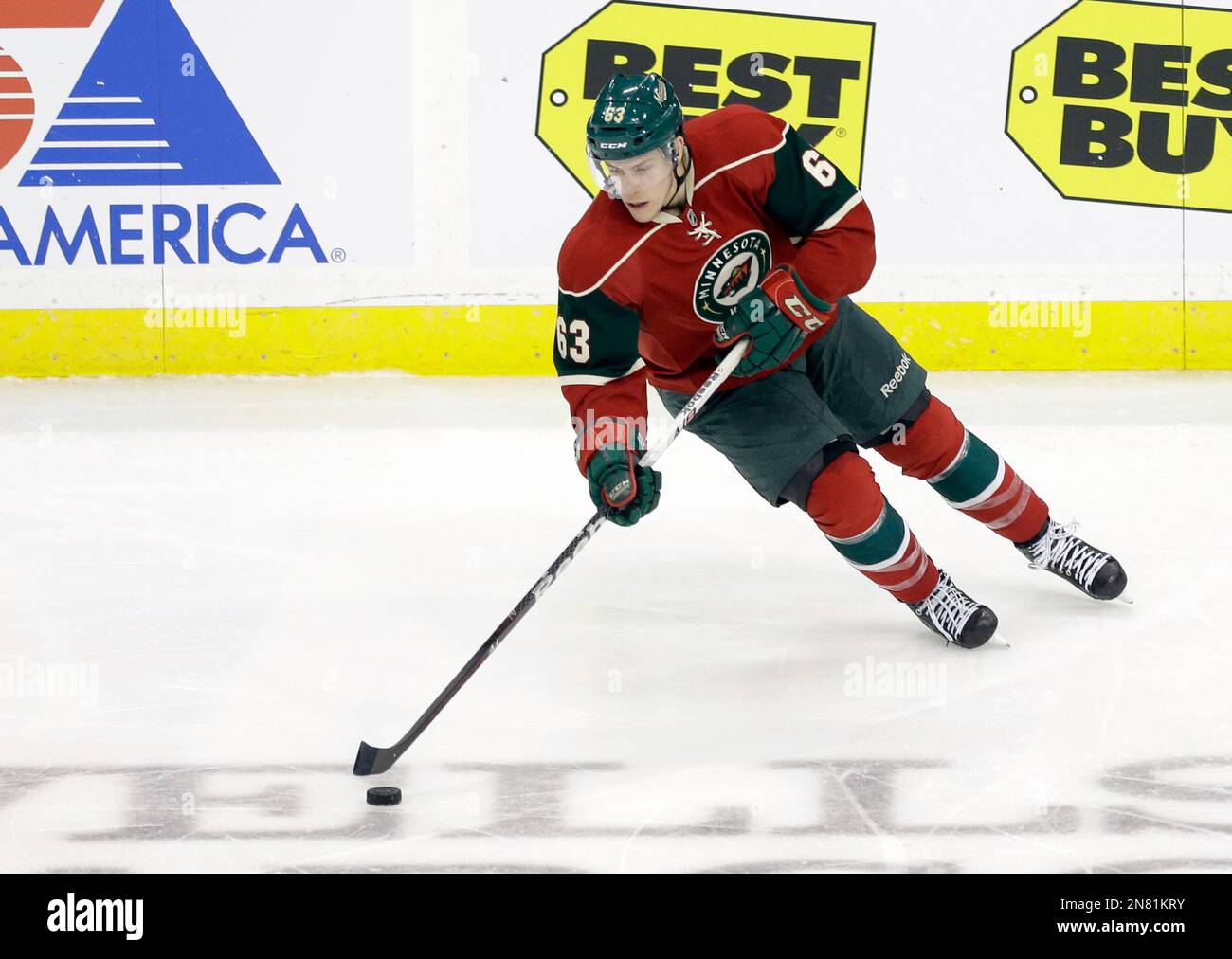 Minnesota Wild's Charlie Coyle skates the puck against the Calgary ...