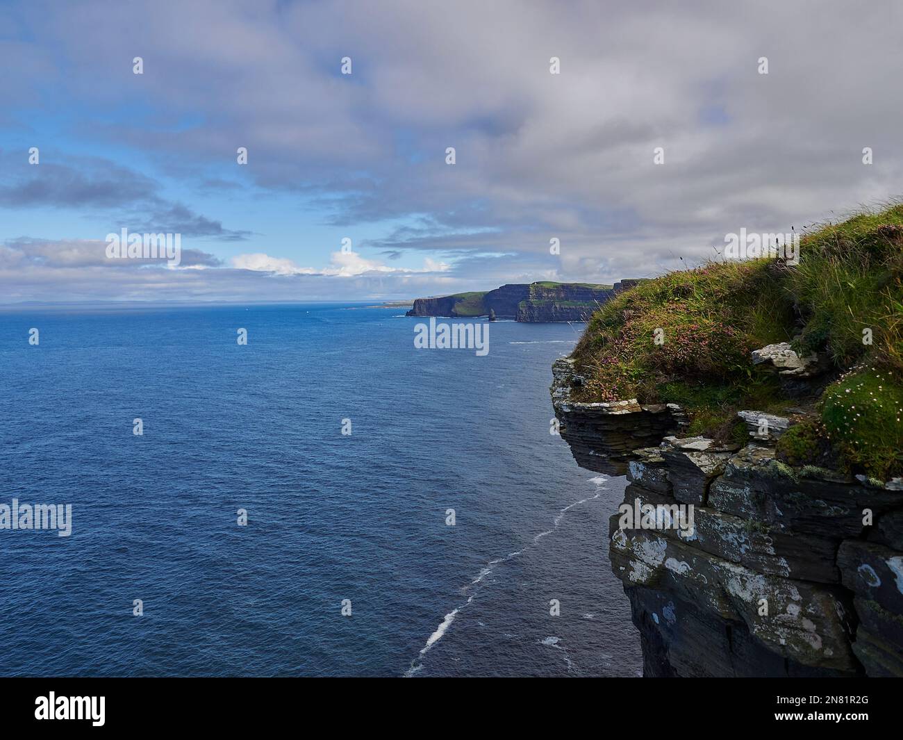 view over the cliffs of Moher in Ireland, a popular hiking destination ...