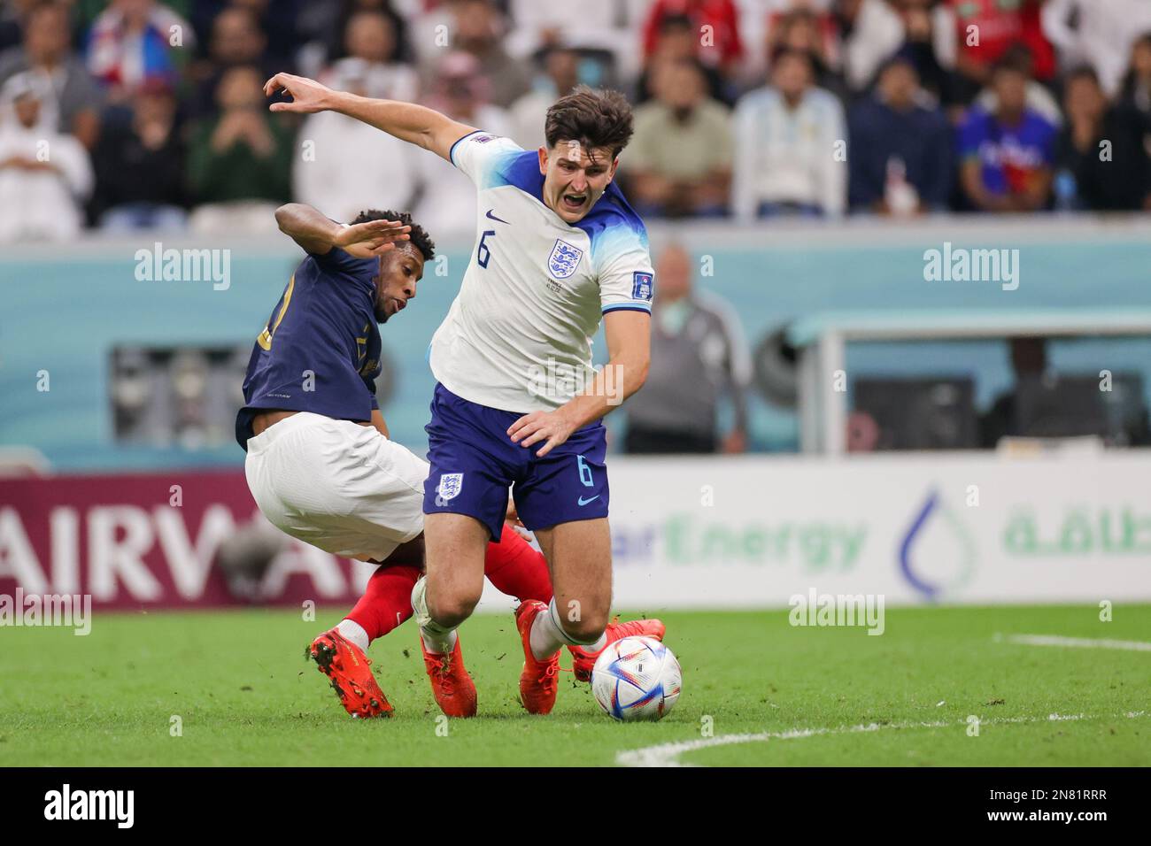 Kingsley Coman of France (L) and Harry Maguire of England (R) in action ...