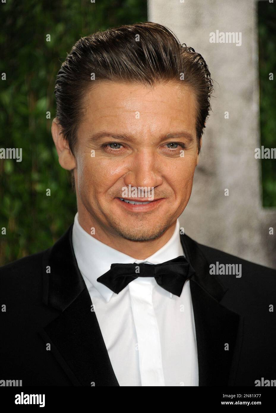 Actor Jeremy Renner arrives at the 2013 Vanity Fair Oscars Viewing and ...