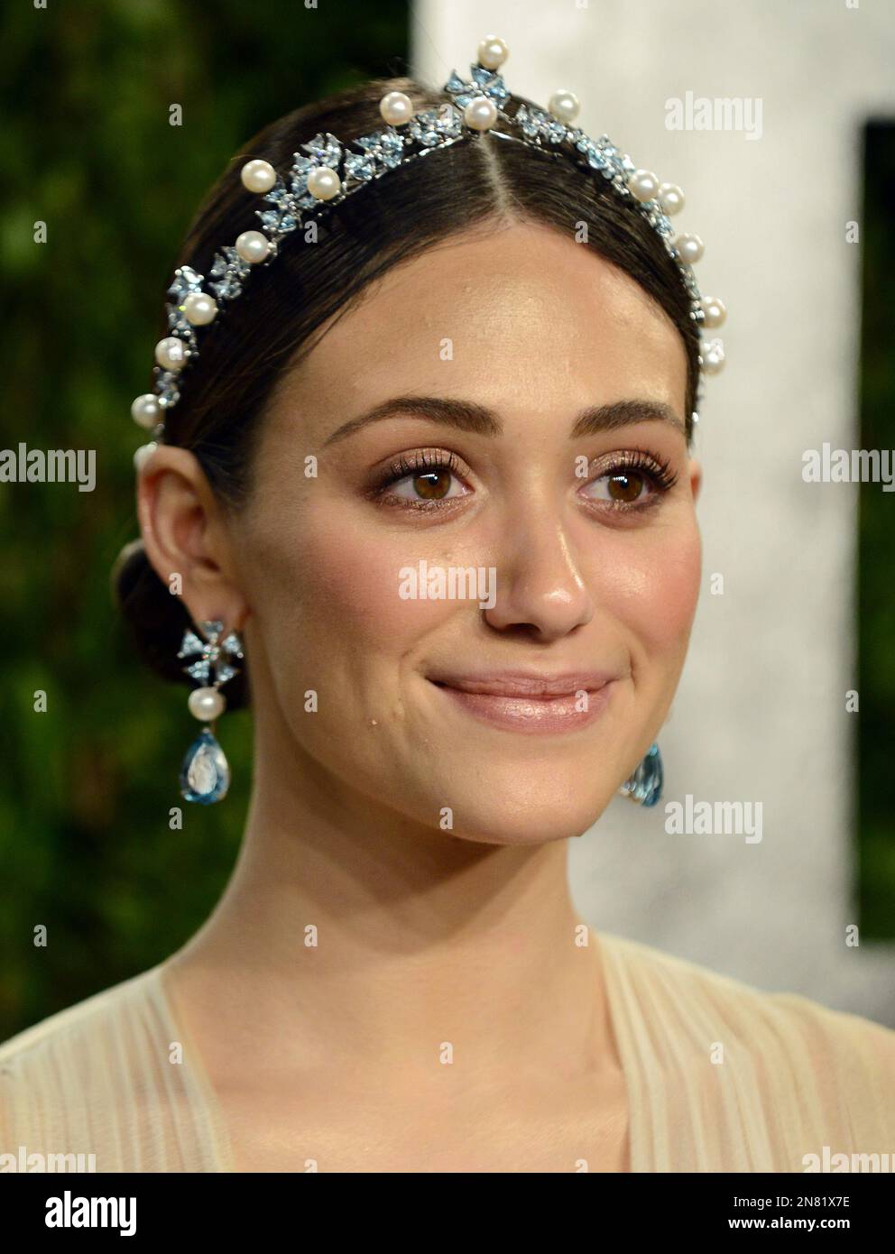 Actress Emmy Rossum arrives at the 2013 Vanity Fair Oscars Viewing and ...