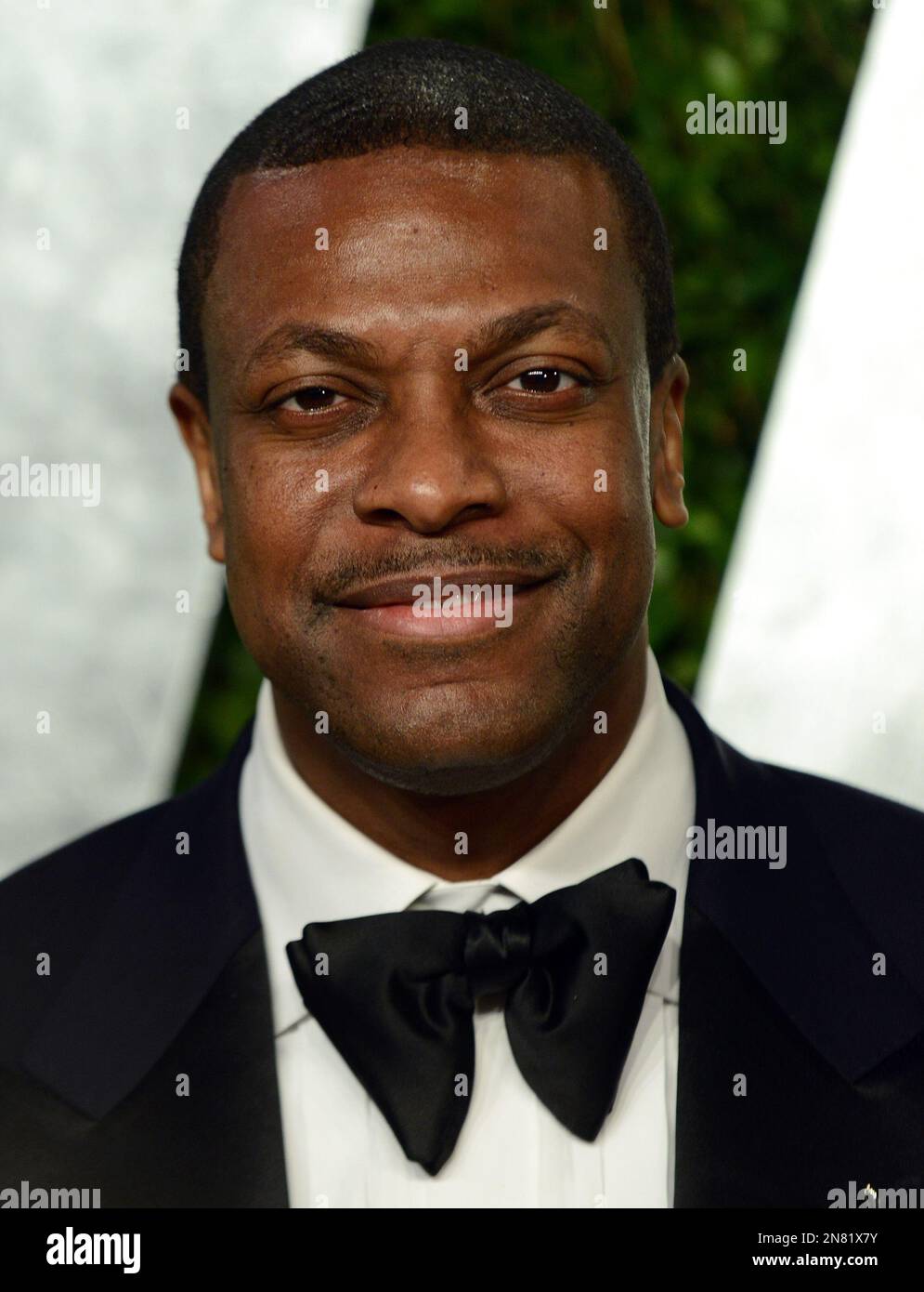Actor Chris Tucker arrives at the 2013 Vanity Fair Oscars Viewing and ...