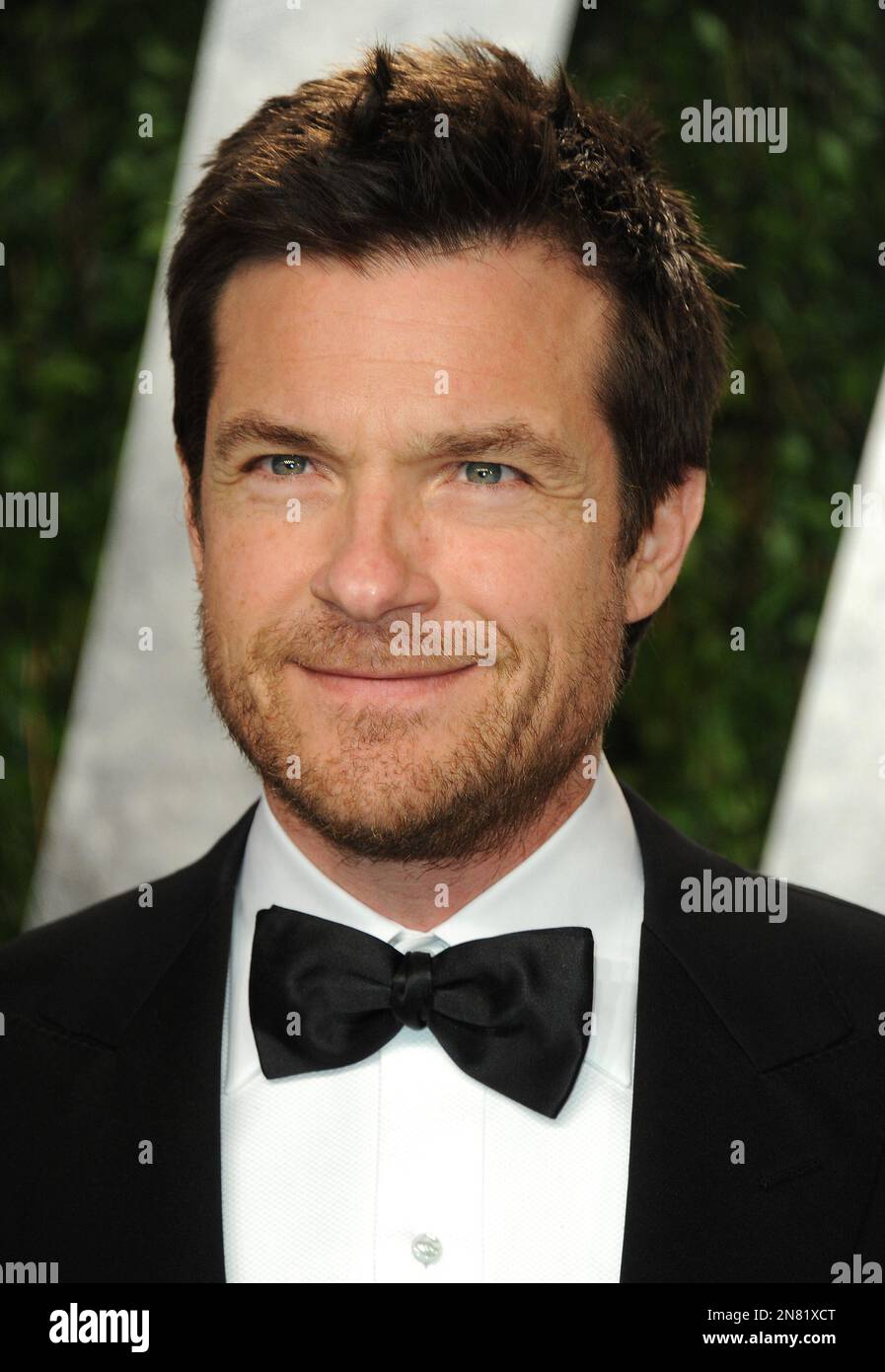 Actor Jason Bateman arrives at the 2013 Vanity Fair Oscars Viewing and ...