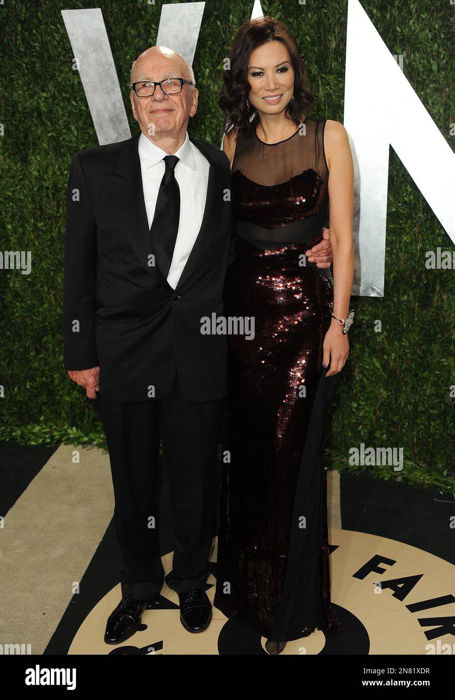 From left, Rupert Murdoch and wife Wendi Deng Murdoch arrive at the ...
