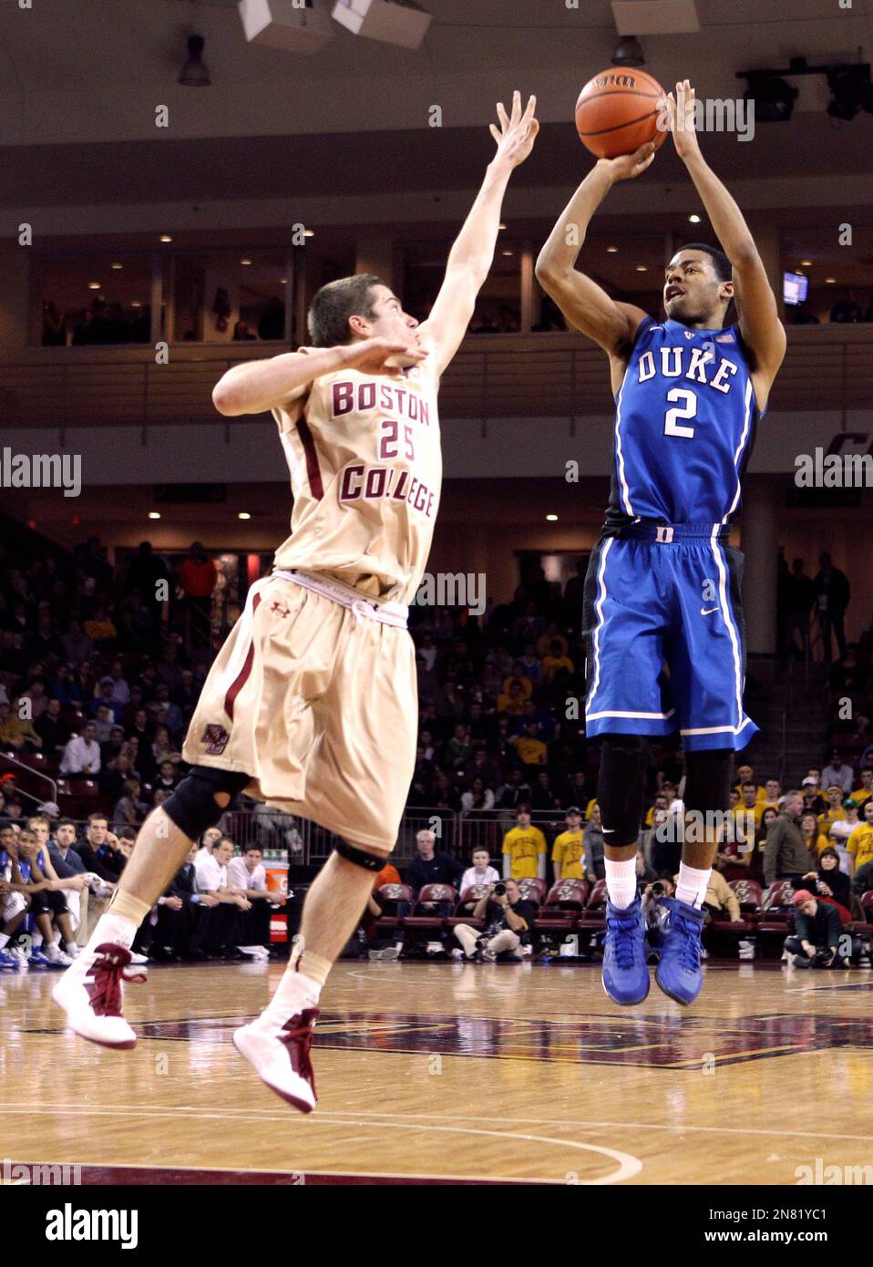 Duke's Quinn Cook (2) shoots against the defense of Boston College's ...