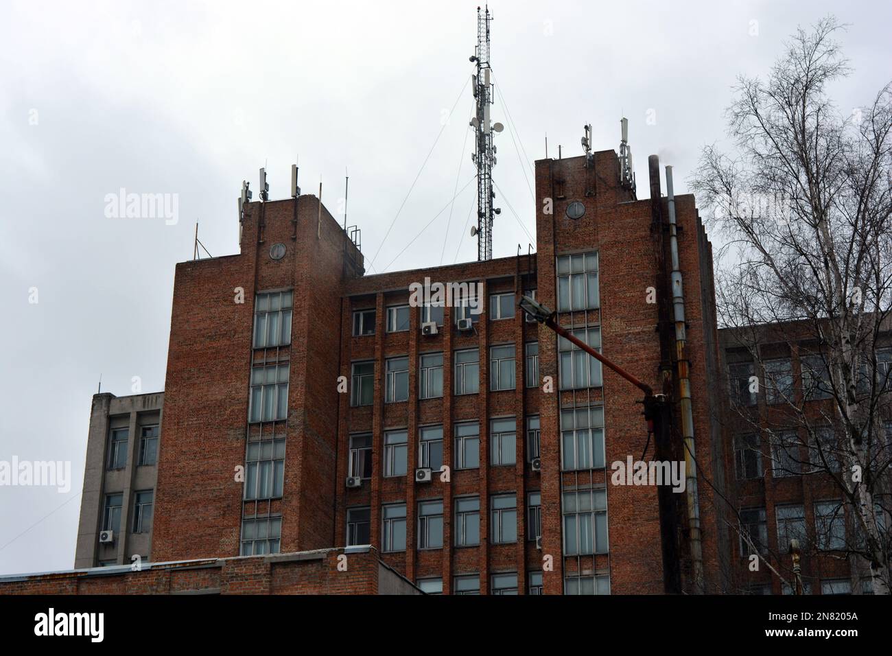 A large building commissioned made of red strong brick, a very ...