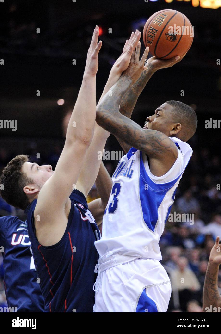 Seton Hall's Fuquan Edwin, right, shoots over Connecticut's Tyler ...