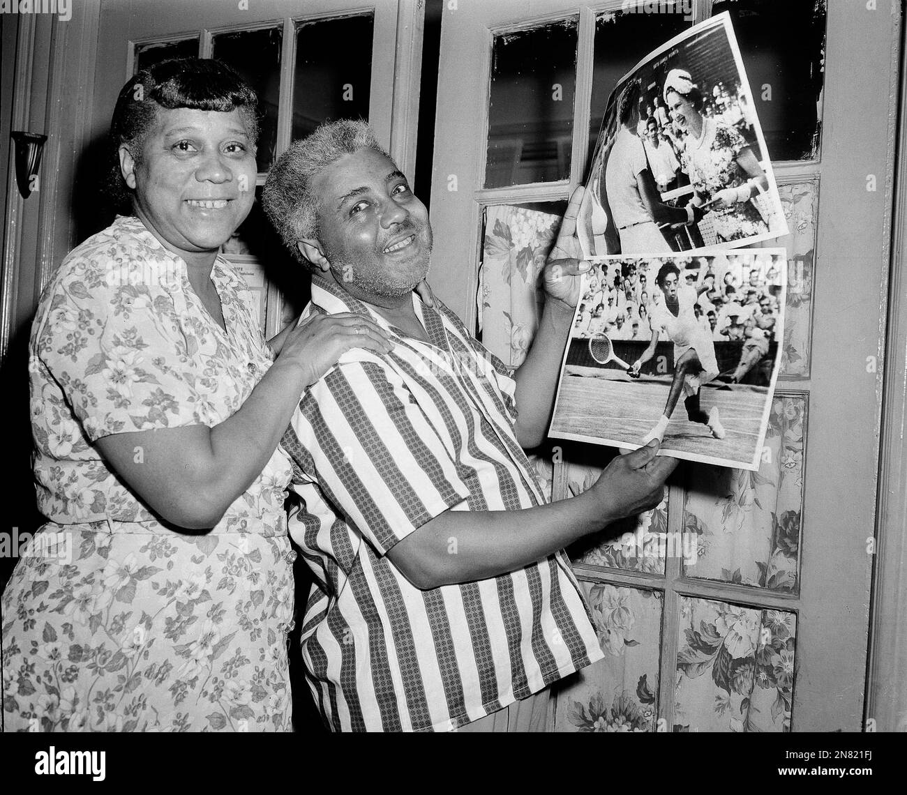 Daniel Gibson and his wife Annie beam at their home in New York as they ...