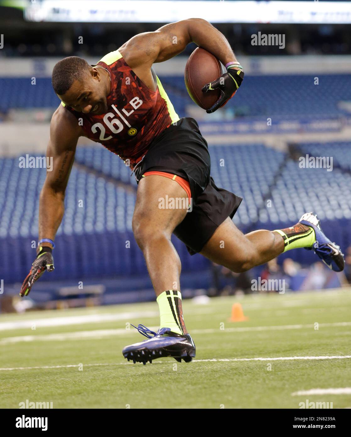 Howard linebacker Keith Pough runs a drill during the NFL football ...