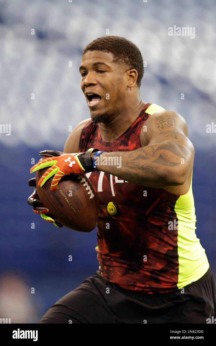 North Carolina linebacker Kevin Reddick runs a drill at the NFL ...