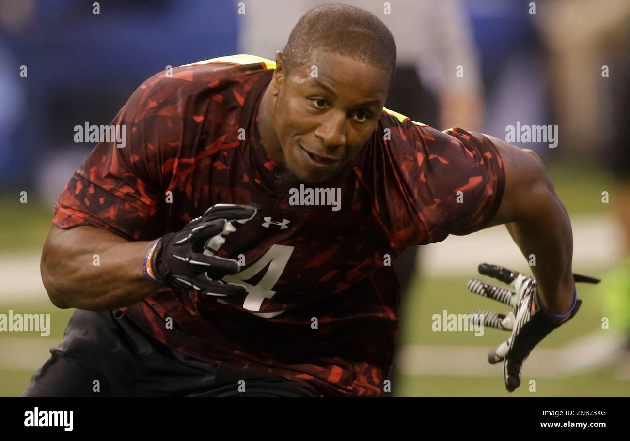 Florida linebacker Jonathan Bostic runs a drill during the NFL football ...