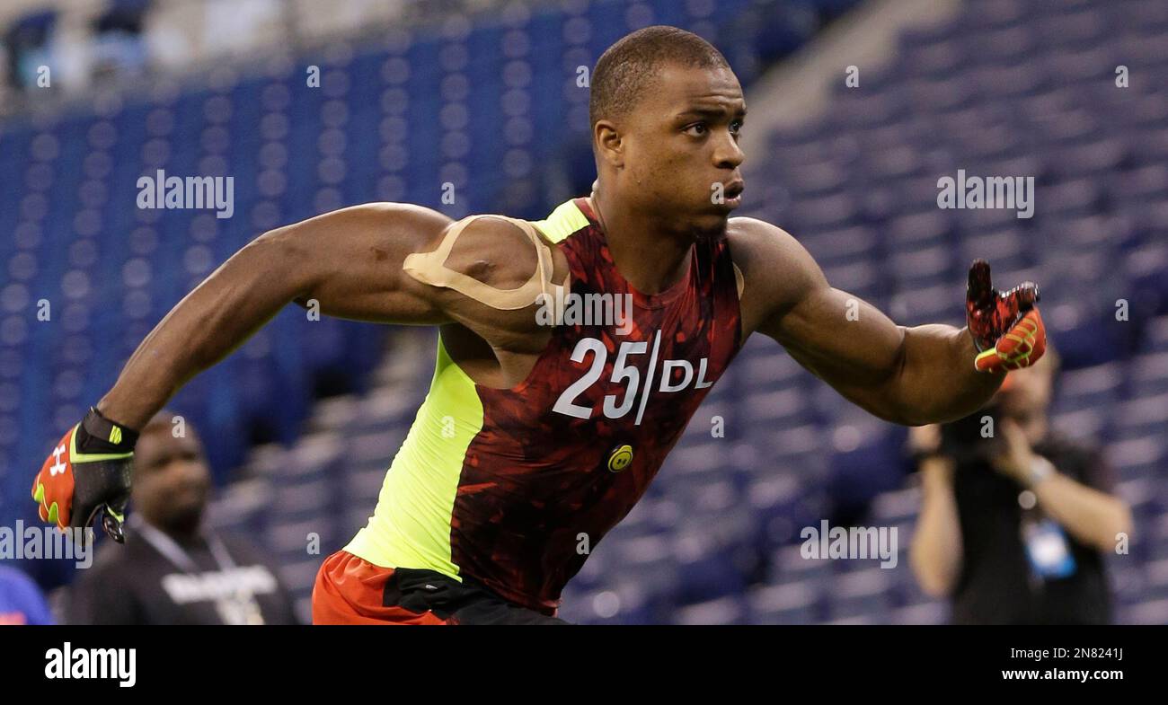 Oregon defensive lineman Dion Jordan runs a drill during the NFL ...